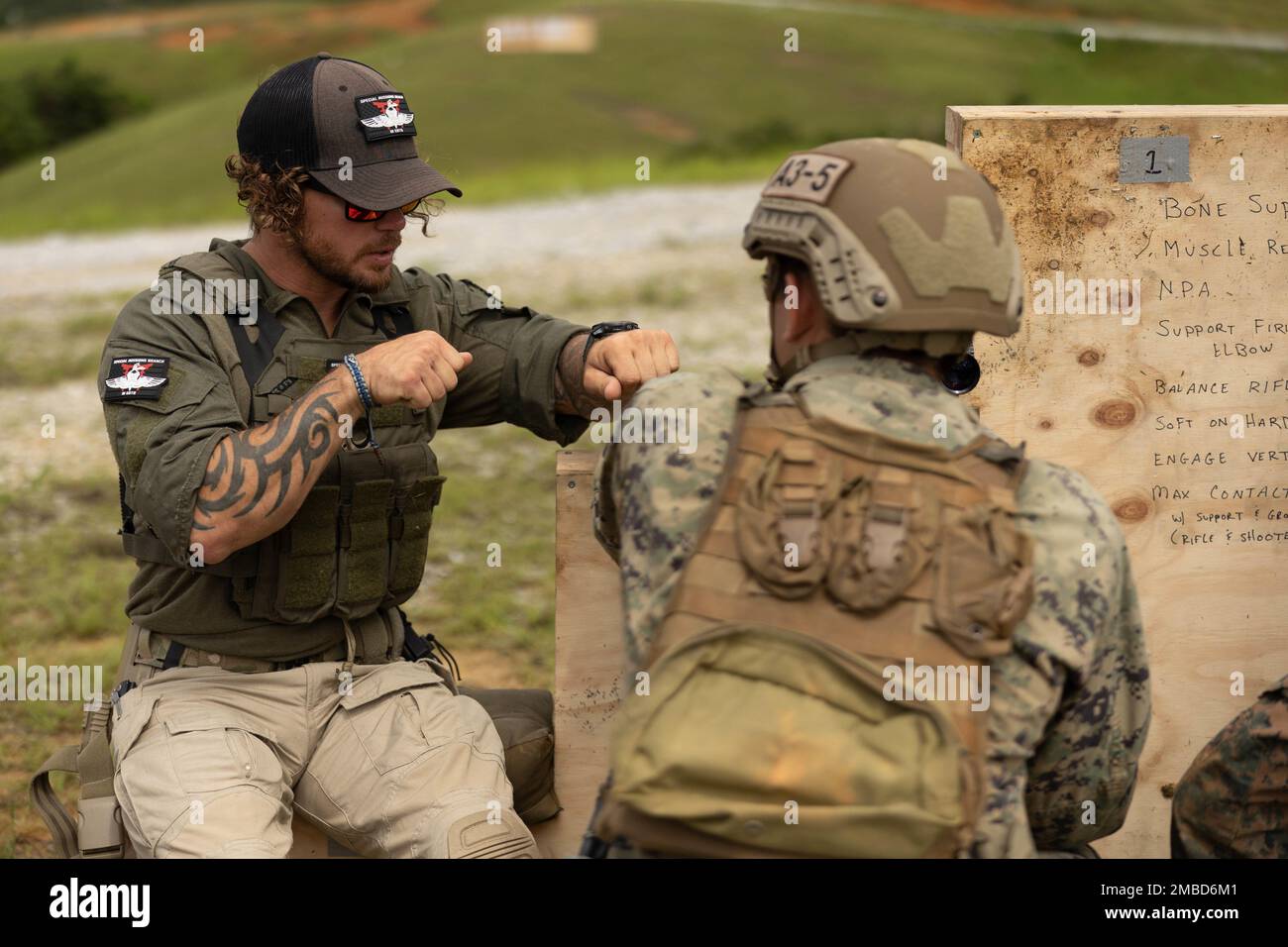 A civilian instructor with the Expeditionary Operations Training Group ...