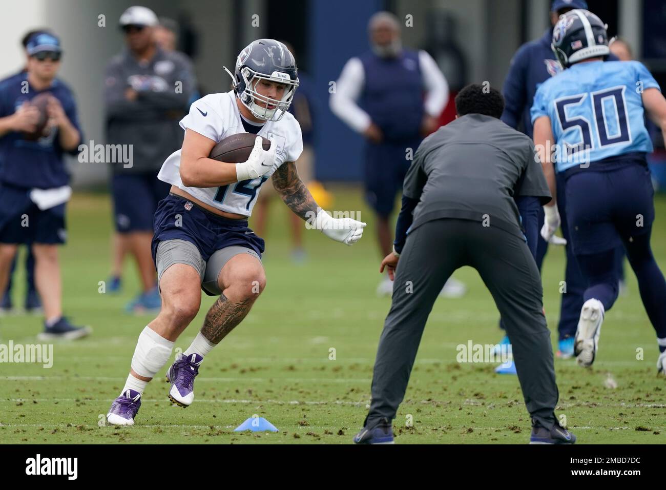 Tennessee Titans fullback Tory Carter (44) takes part in a drill at the ...