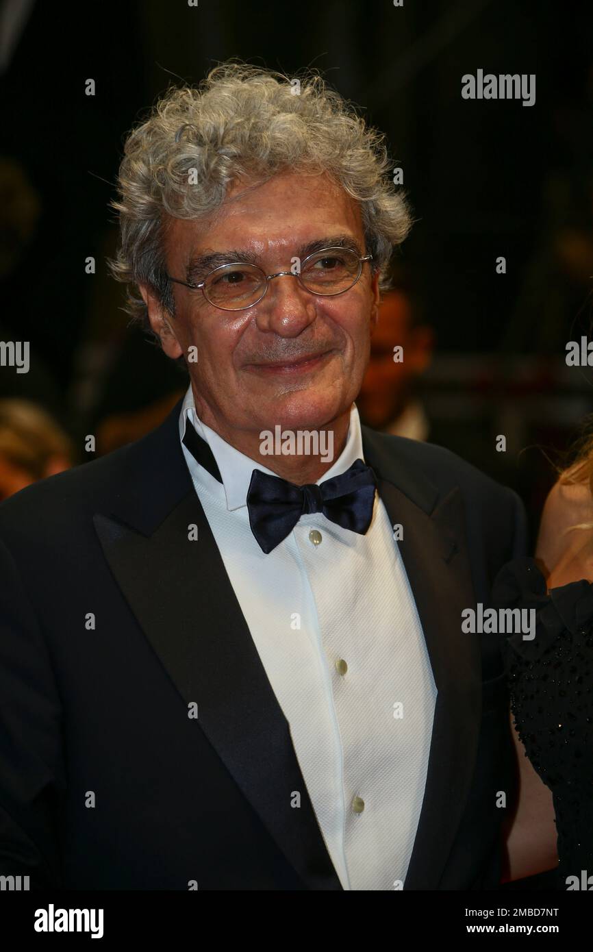 Director Mario Martone poses for photographers upon arrival at the ...