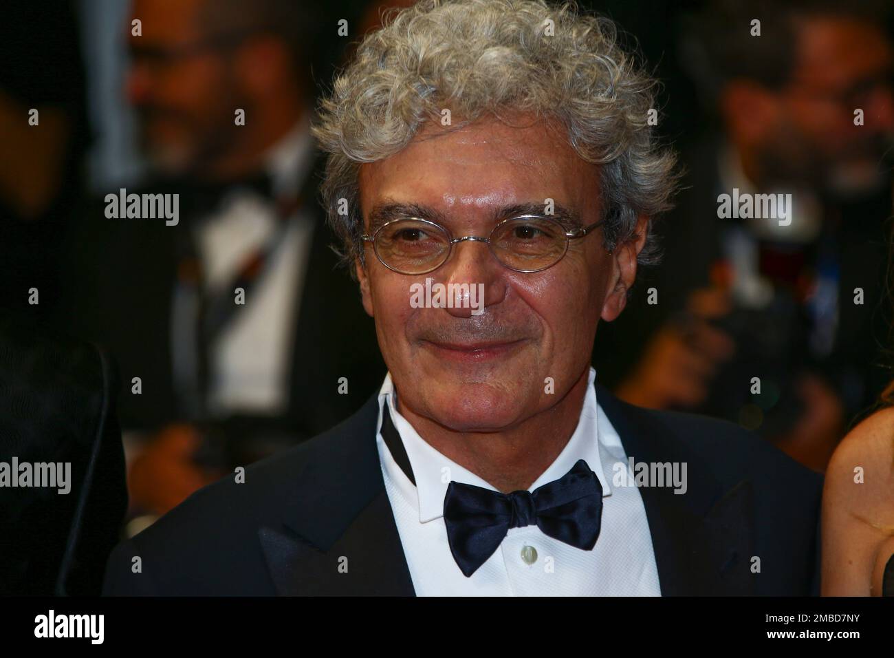 Director Mario Martone poses for photographers upon arrival at the ...