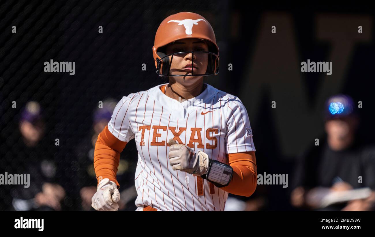 Texas' Alyssa Washington jogs to first base during an NCAA softball ...