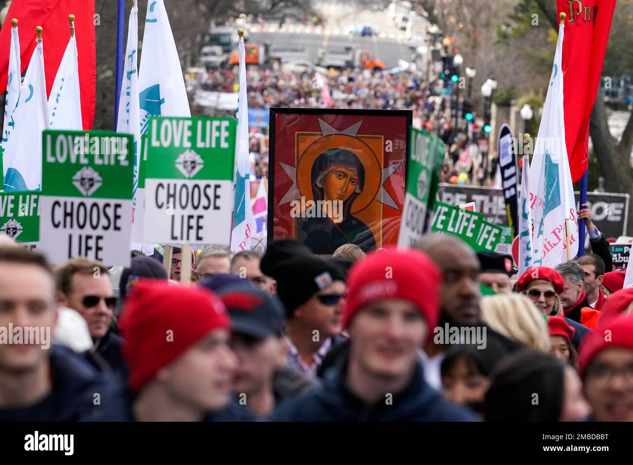 Anti-abortion demonstrators march toward the U.S. Supreme Court during ...