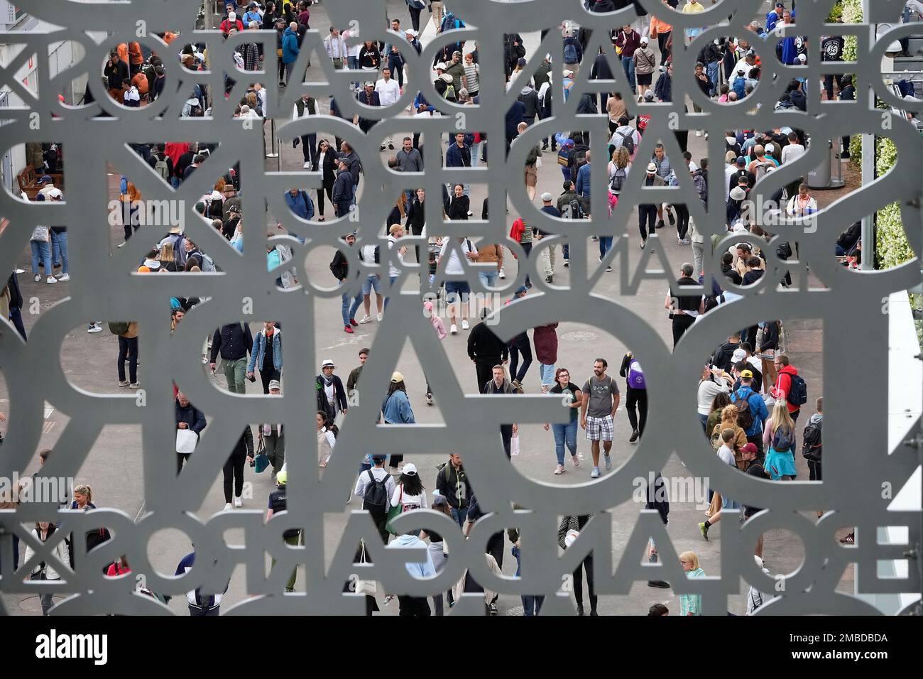 Spectators stroll in the alleys of the Roland Garros stadium during the ...