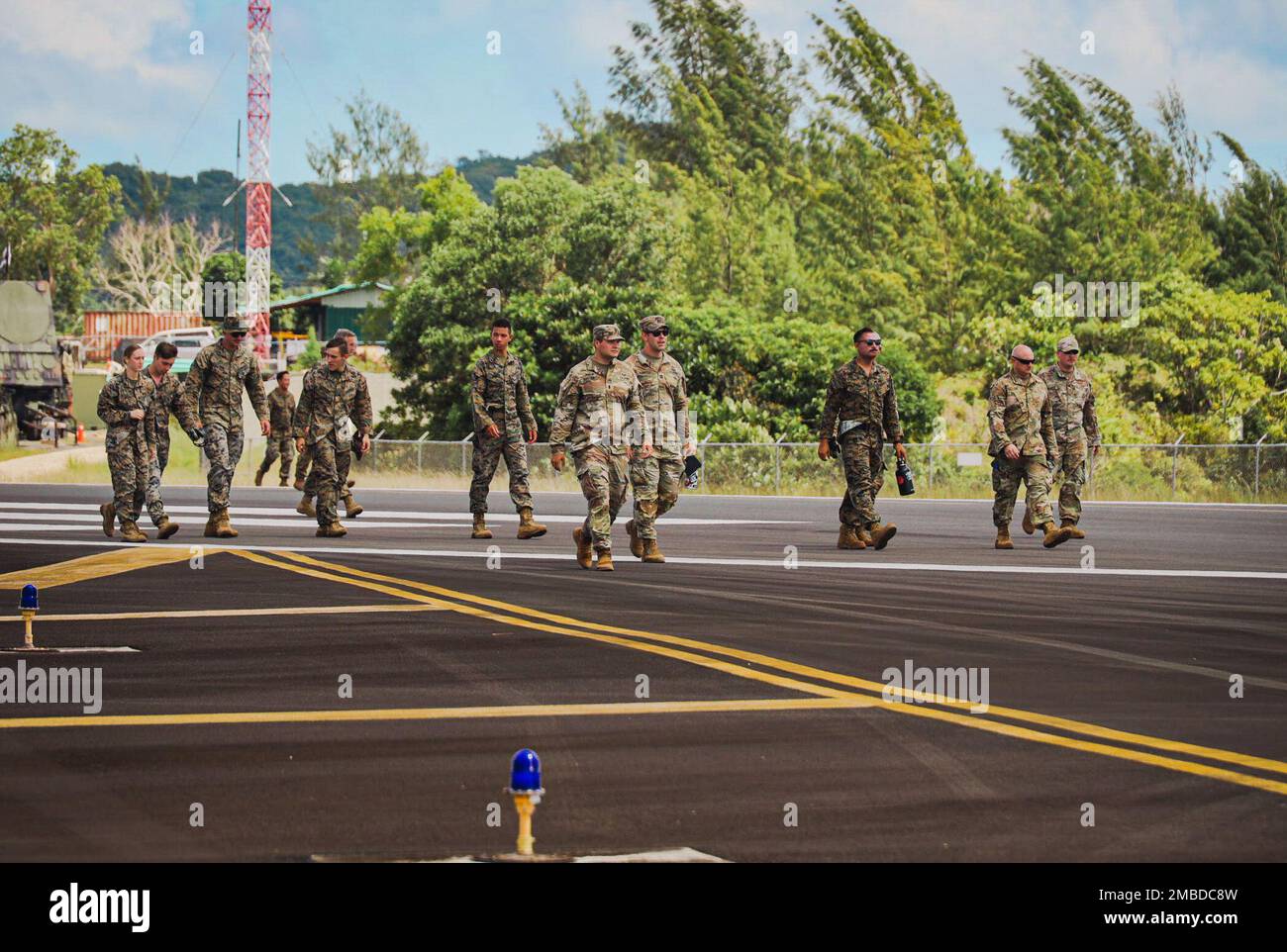U.S. Marines, Airmen and Soldiers conduct a foreign object debris check ...
