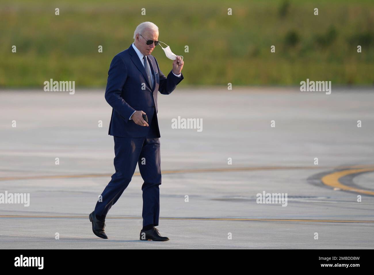 U.S. President Joe Biden walks to Air Force One at Yokota Air Base in ...