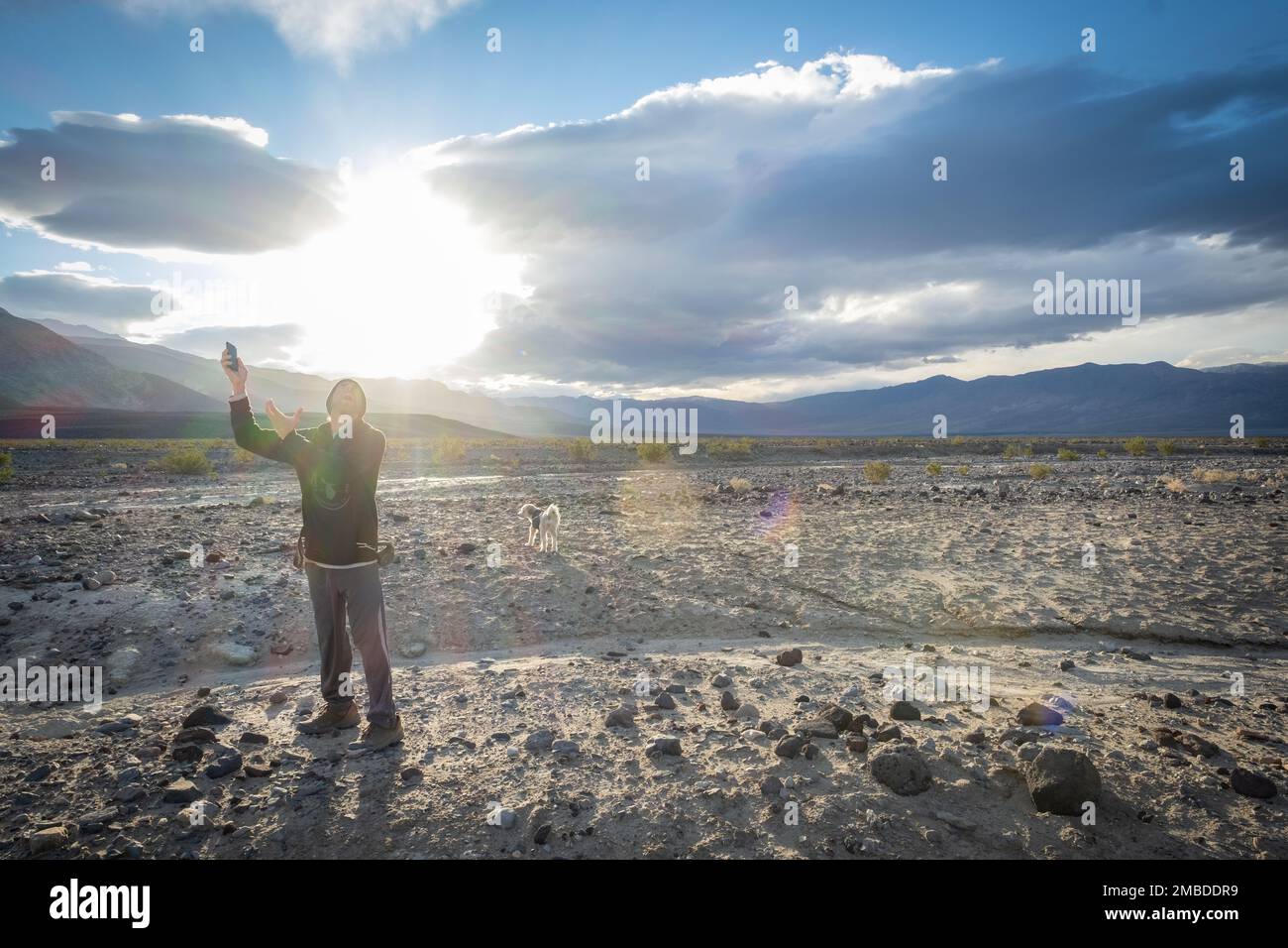 A man begs God for cell signal in a remote, lonely desert Stock Photo ...