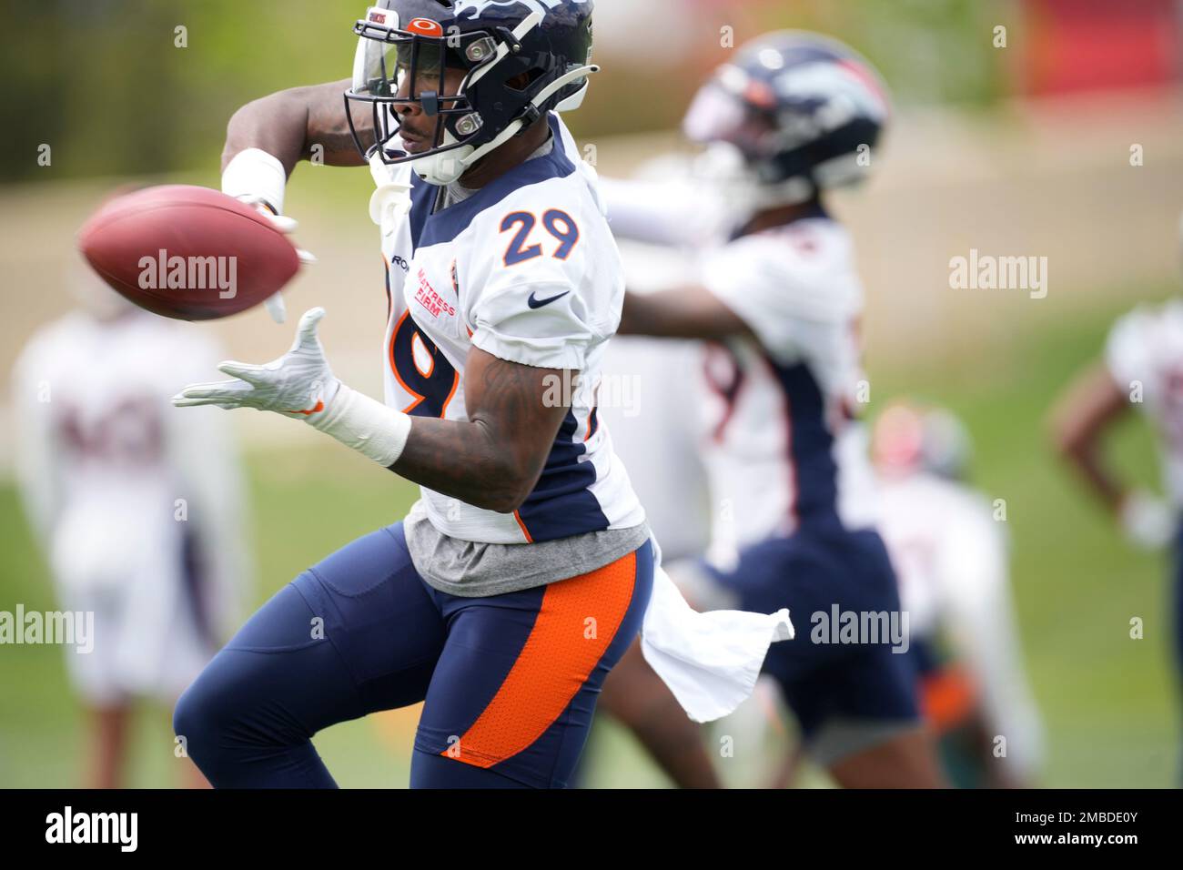Denver Broncos rookie cornerback Faion Hicks takes part in drills at ...