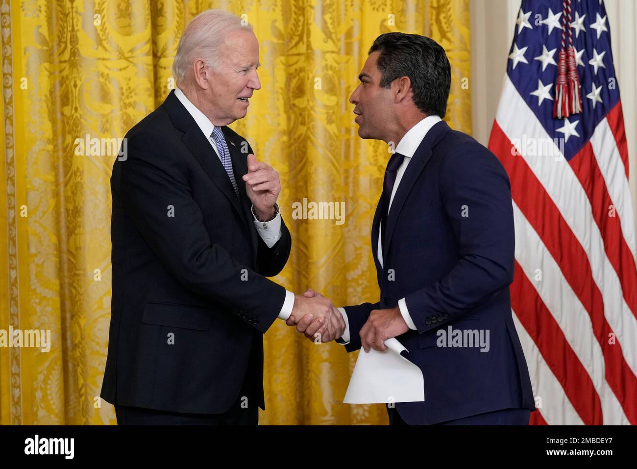 President Joe Biden shakes hands with Miami Mayor Francis Suarez before ...