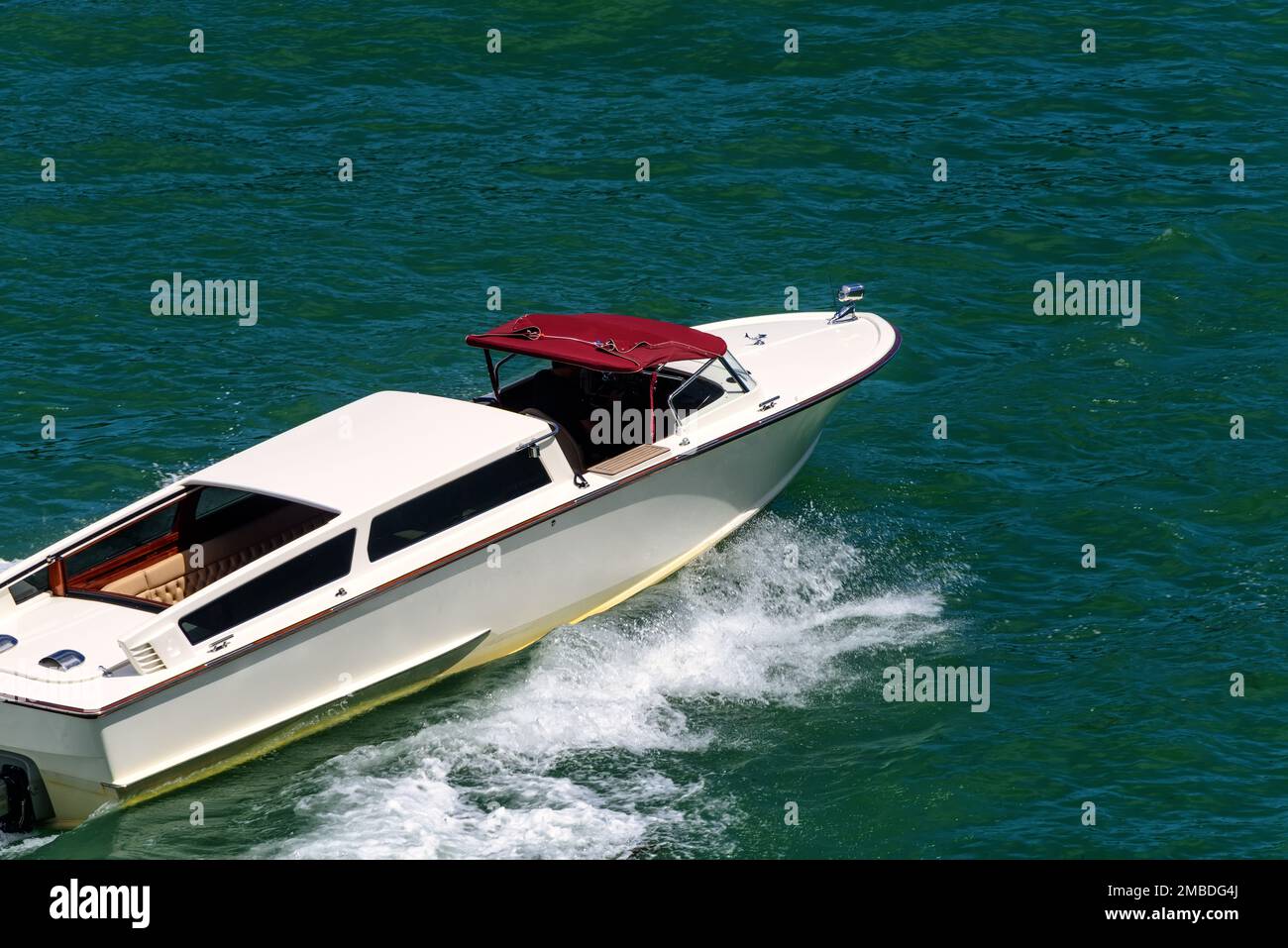 Luxury Italian speedboat through the waters near Venice, Italy Stock ...