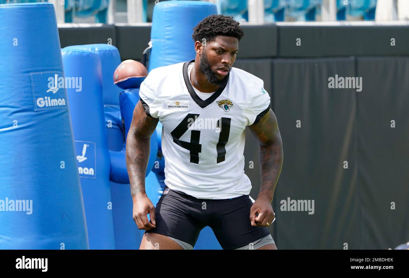 Jacksonville Jaguars Josh Allen (41) performs a drill at an NFL ...