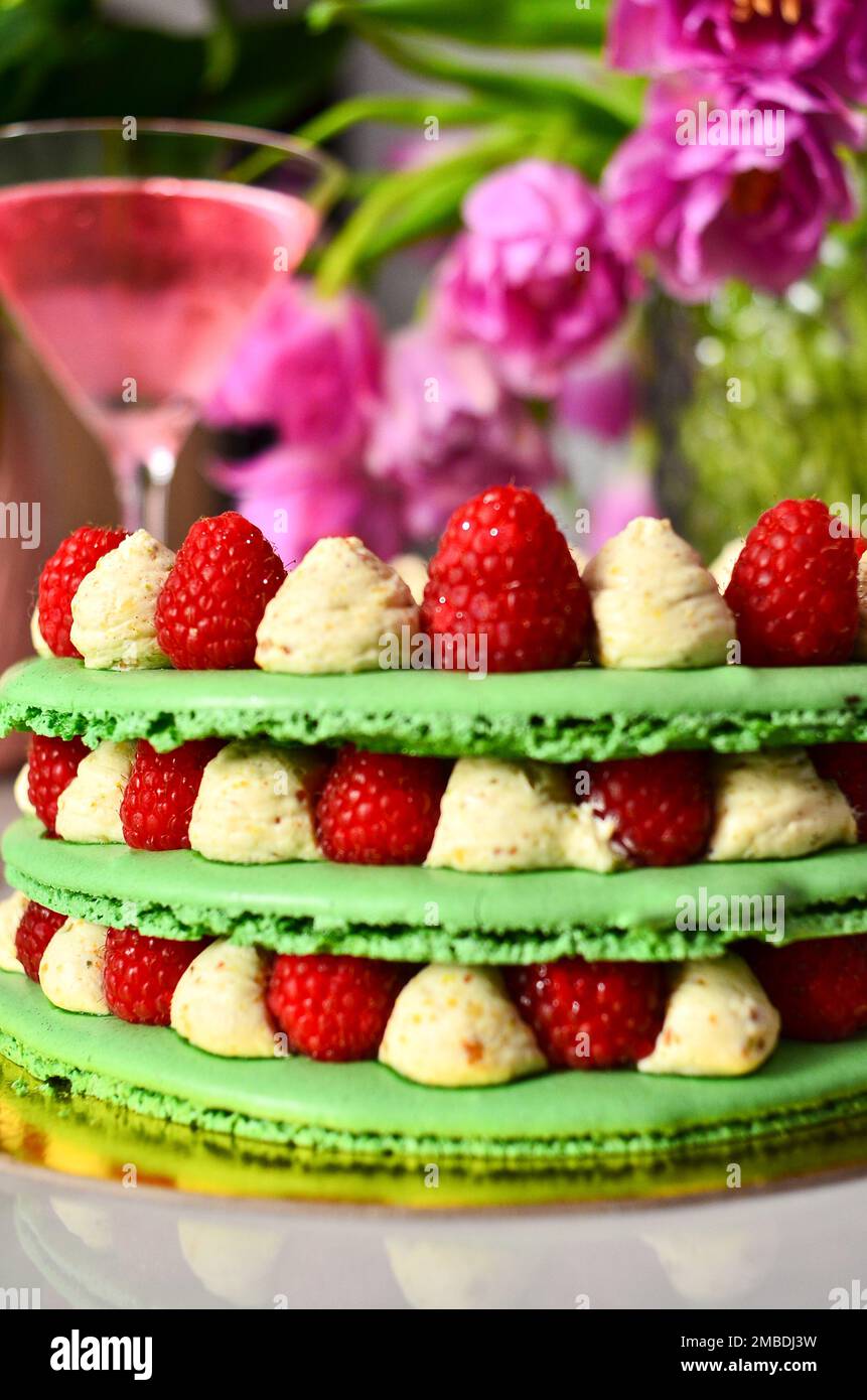 birthday cake made of pistachio, raspberry and vanilla cream and pink ...