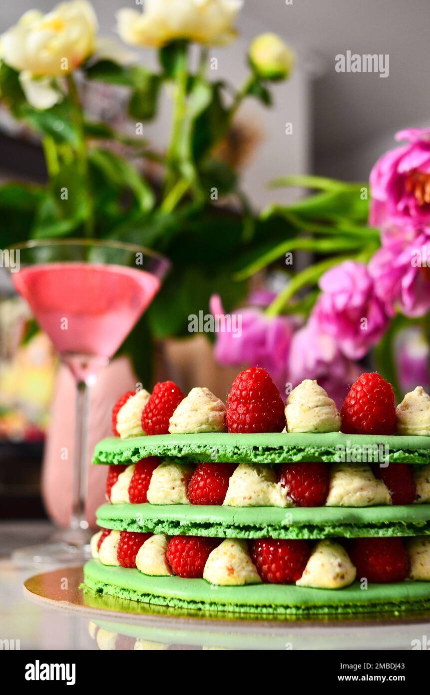 birthday cake made of pistachio, raspberry and vanilla cream and pink ...