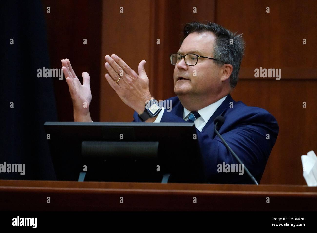 Dr. Richard Moore, Jr., testifies in the courtroom at the Fairfax ...