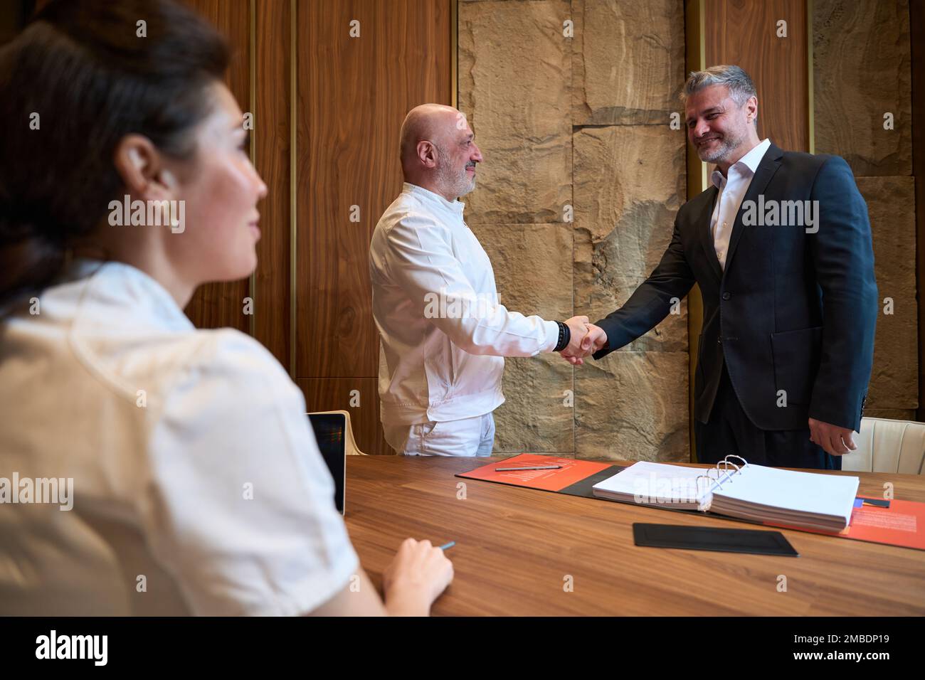 Handshake between a doctor and a patient in an office Stock Photo - Alamy