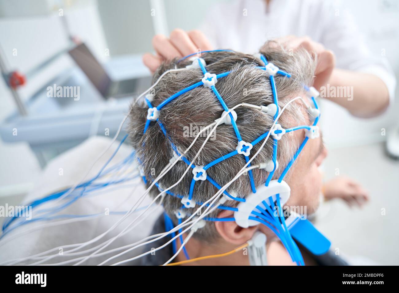 Middle-aged man undergoes a check-up in a modern clinic Stock Photo - Alamy