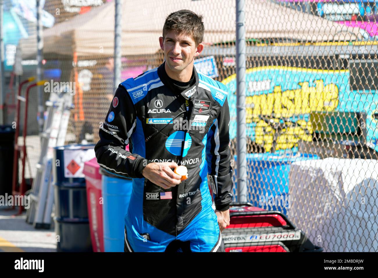 Ricky Taylor walks pit road during auto race testing for the upcoming ...