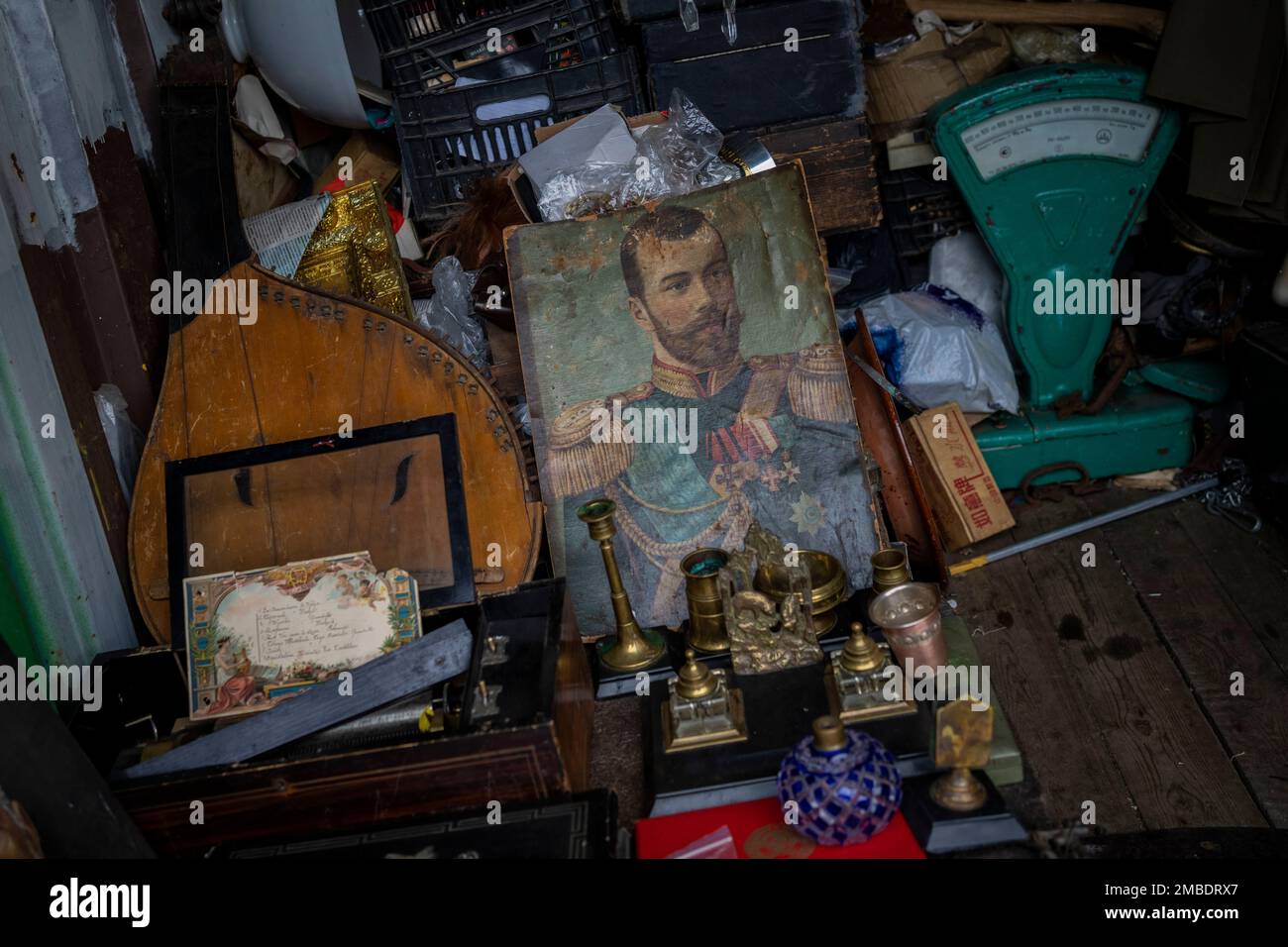 A painting of the last Russian Czar, Nicholas II, is surrounded by old ...