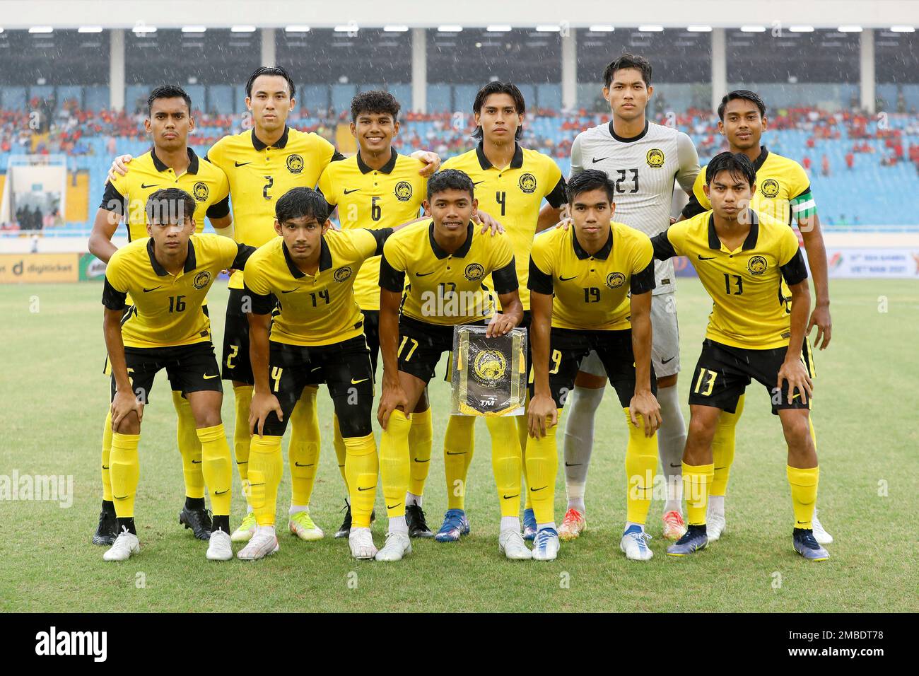 Malaysia's football team poses for a group photo before the men's ...