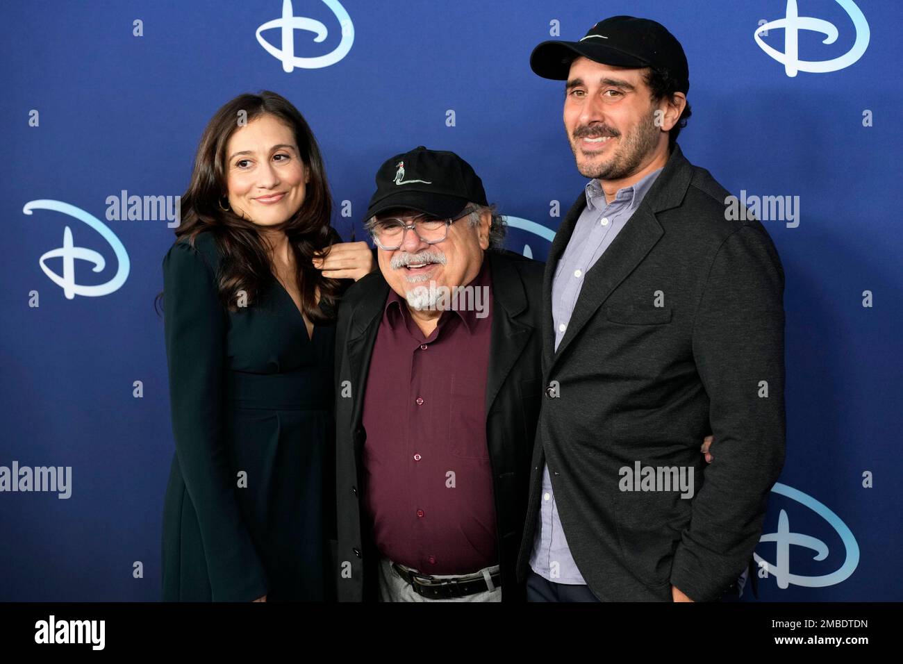 Lucy DeVito, left, Danny DeVito and Jake DeVito attend the Disney 2022 ...