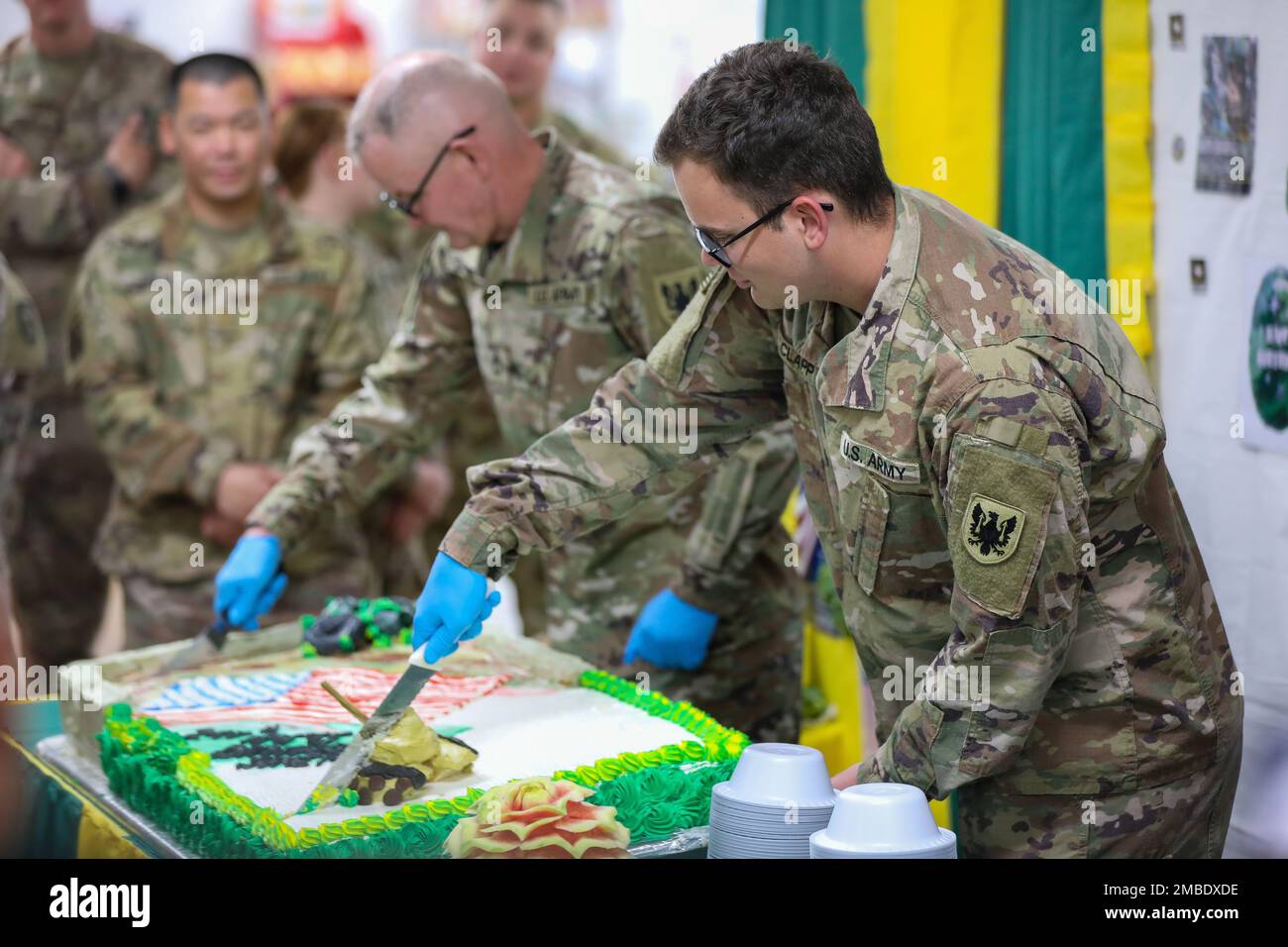 U.S. Army Sgt. 1st Class Joseph Carpenter, center-left, and Pfc. Aaron ...