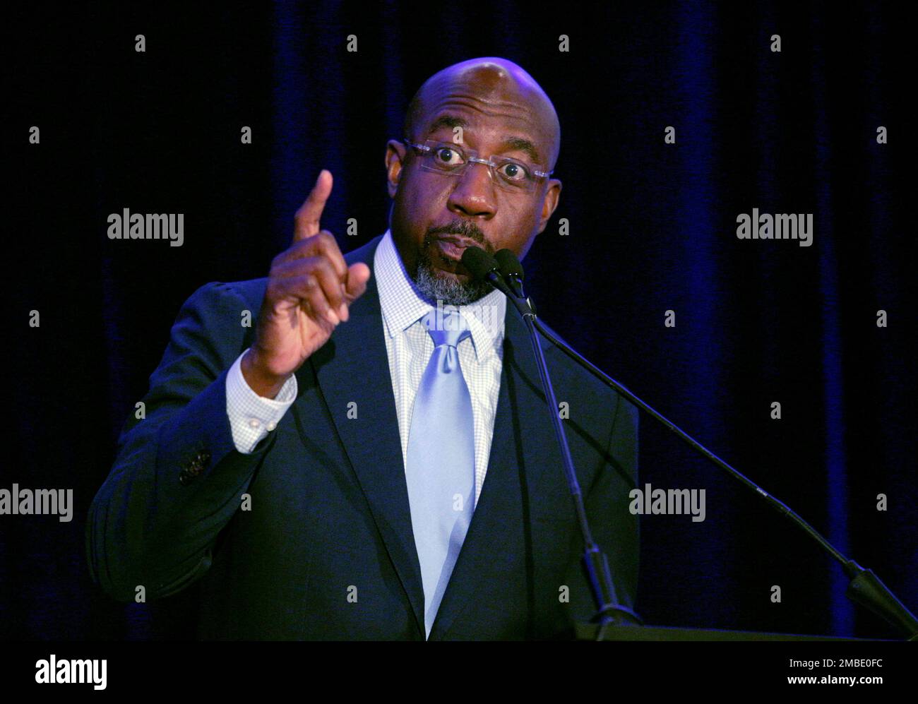Sen. Raphael Warnock, D-Ga., addresses the Gwinnett County Democratic ...