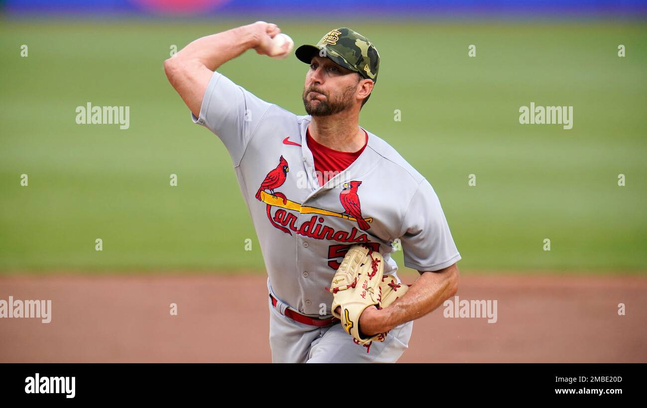 St. Louis Cardinals starting pitcher Adam Wainwright delivers during ...