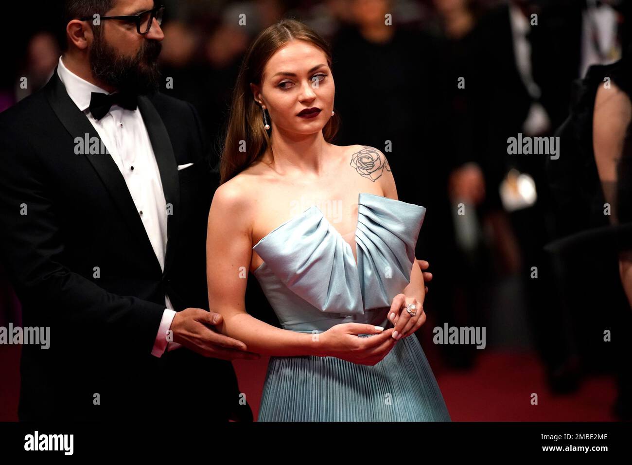 Marin Grigore, left, and Macrina Barladeanu pose for photographers upon ...
