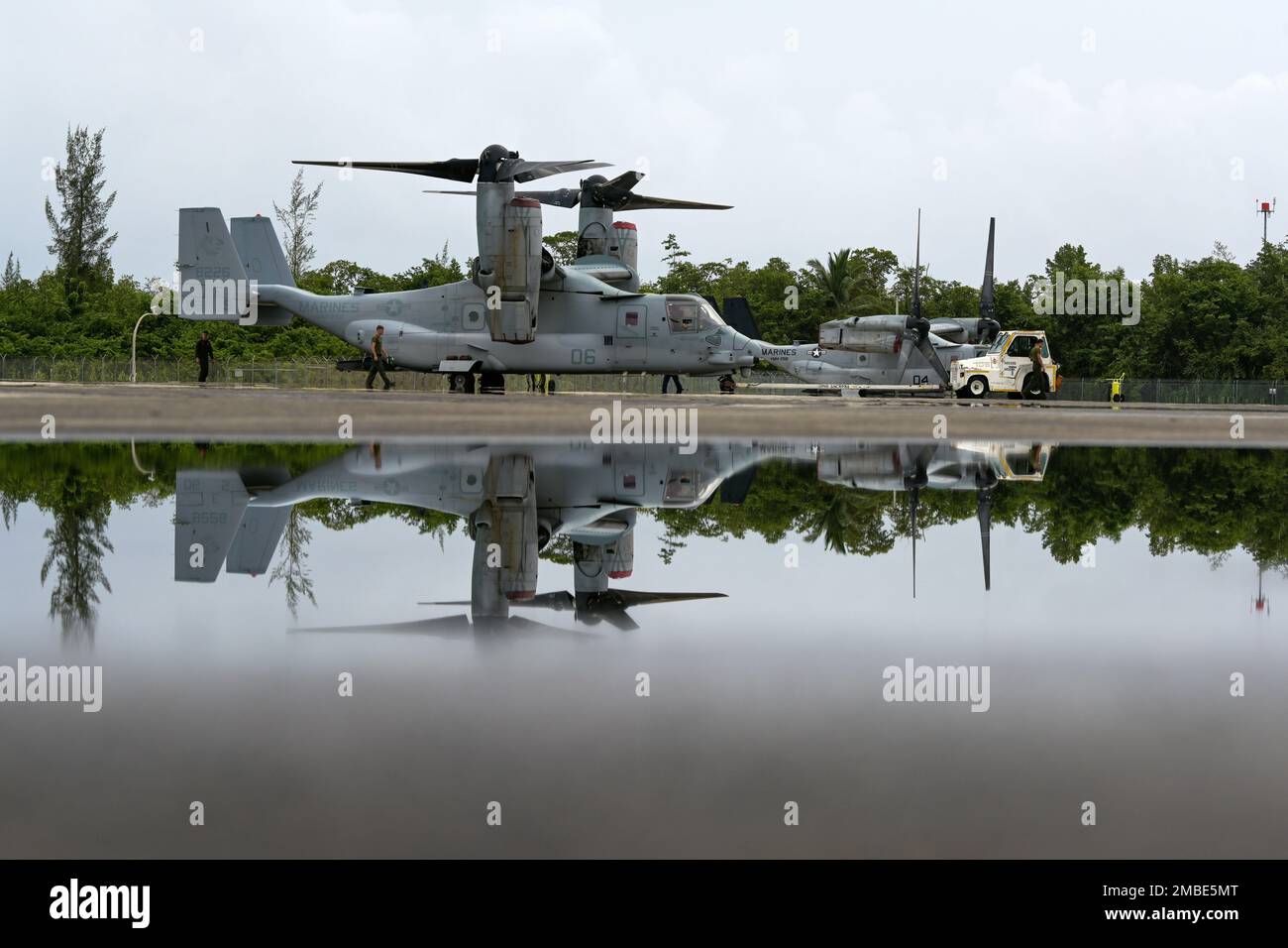 An MV-22B Osprey assigned to Marine Medium Tiltrotor Squadron (VMM) 266 is towed across the ...