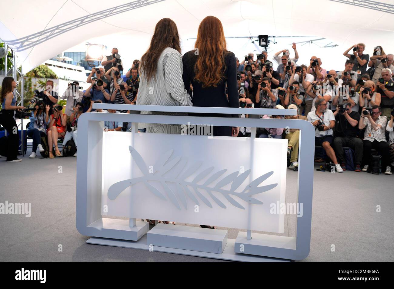 Director Gina Gammell, left, and Riley Keough pose for photographers at ...