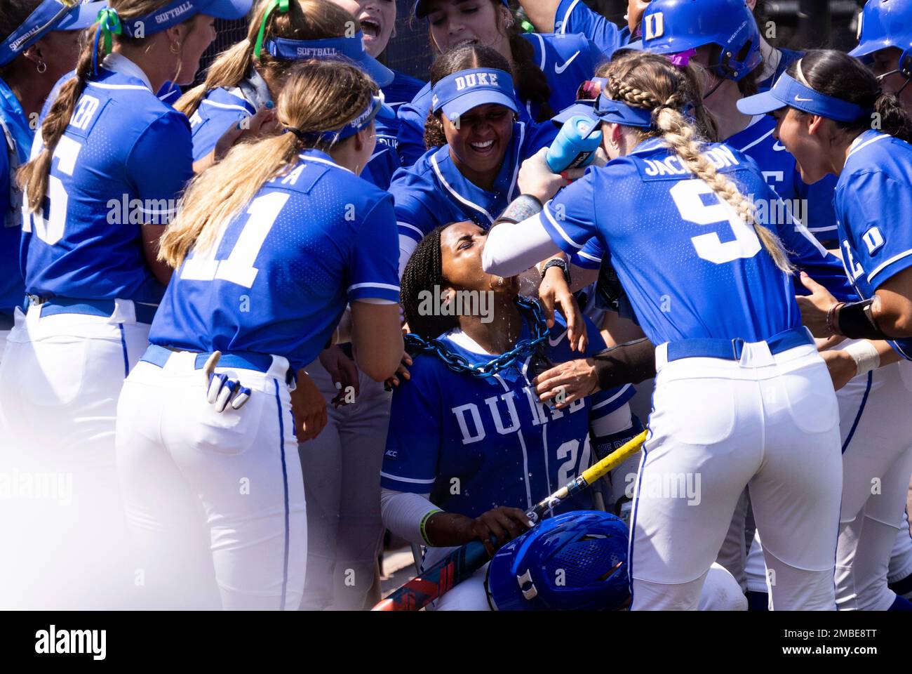 The Duke softball team celebrates Duke utility Kristina Foreman #20 ...