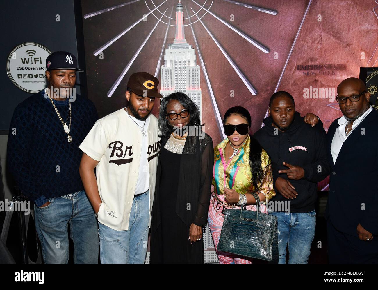 Christopher Wallace Jr., second from left, Voletta Wallace, Lil' Kim ...