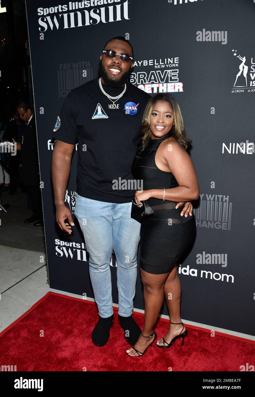 NFL player Andrew Thomas, left, and girlfriend Ashley-Ann Wynter attend ...