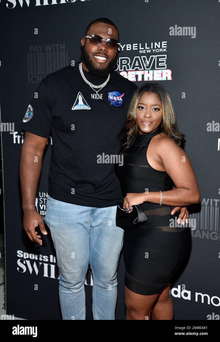 NFL player Andrew Thomas, left, and girlfriend Ashley-Ann Wynter attend ...