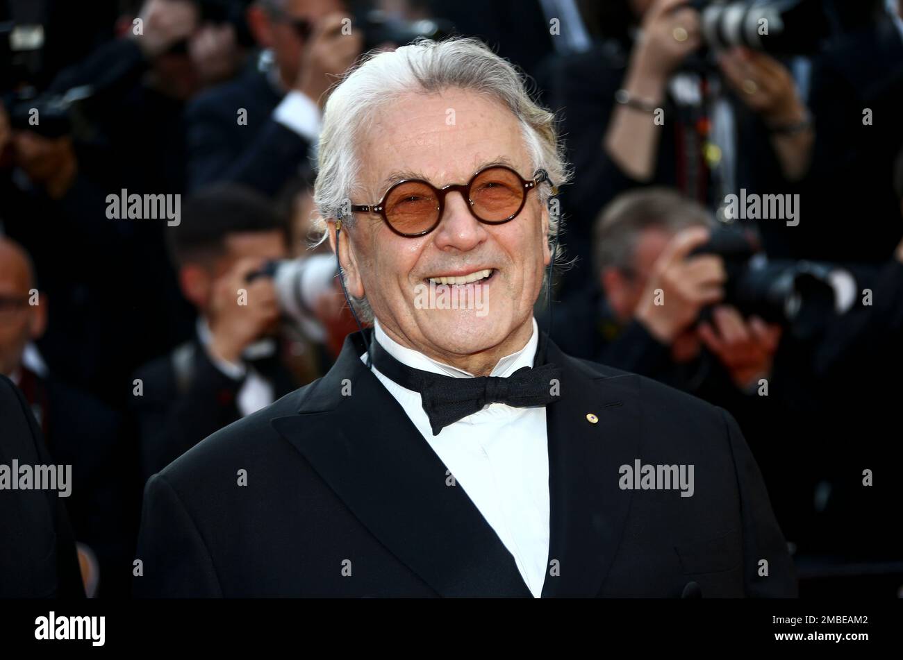 Director George Miller poses for photographers upon arrival at the ...