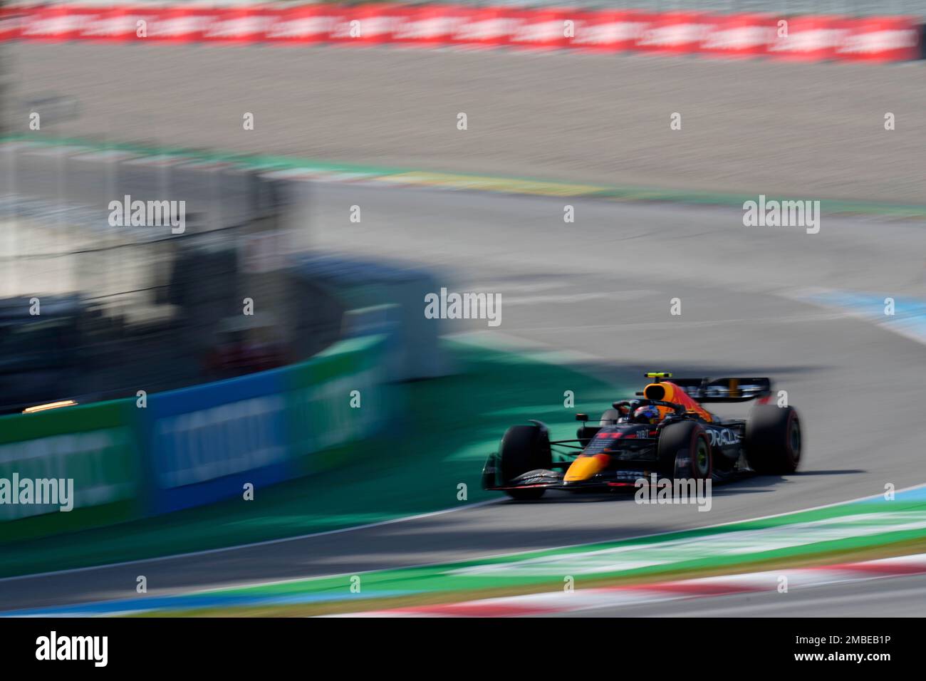 Red Bull driver Sergio Perez of Mexico steers his car during the second practice session at the ...