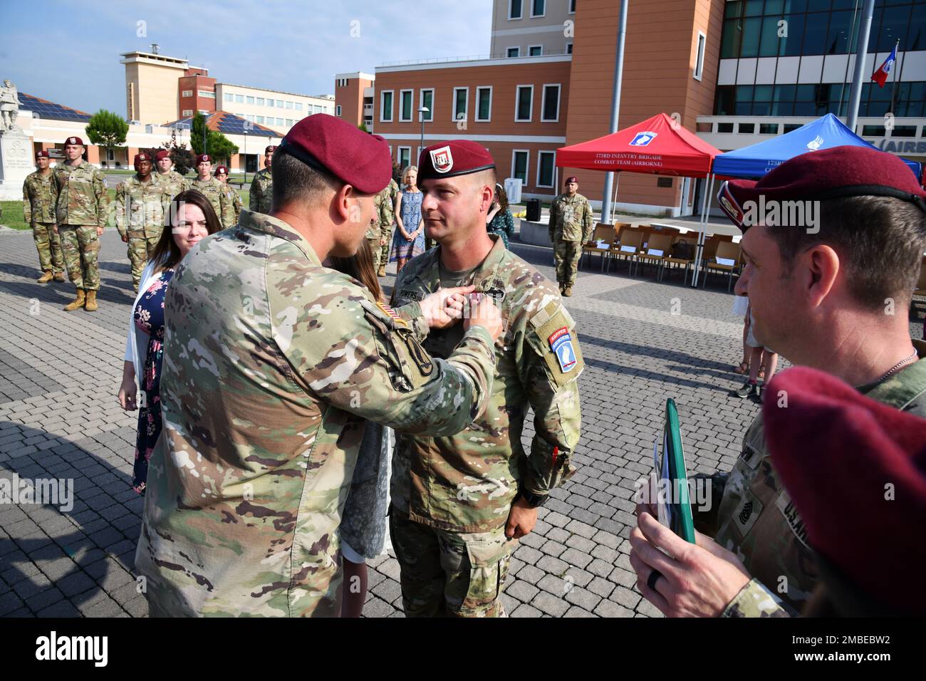 U.S. Army Col. Michael F. Kloepper Commander of 173rd Airborne Brigade, left, pins the ...