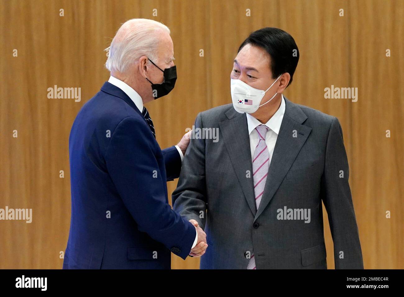 President Joe Biden and South Korean President Yoon Suk Yeol shake ...