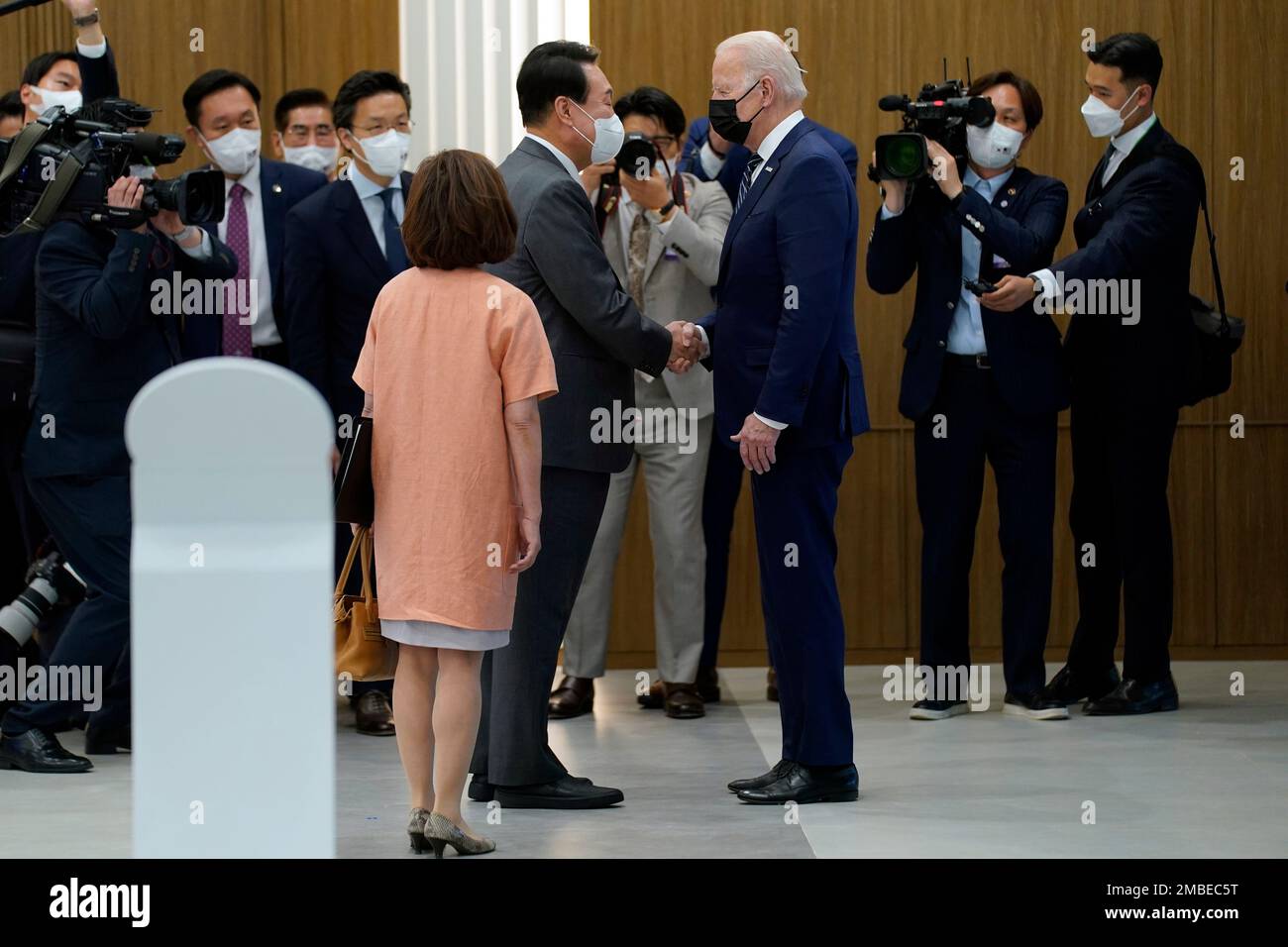 President Joe Biden and South Korean President Yoon Suk Yeol shake ...