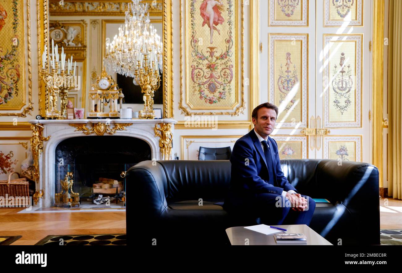French President Emmanuel Macron poses at the Elysee Palace in Paris ...