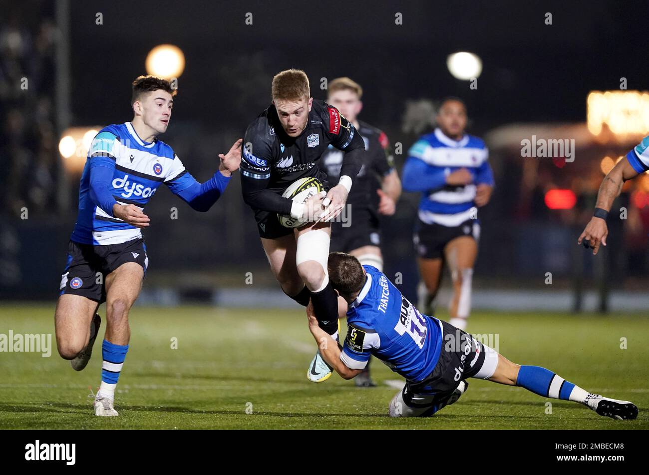 Glasgow Warriors’s Kyle Steyn is tackled by Bath Rugby’s Piers Francis ...