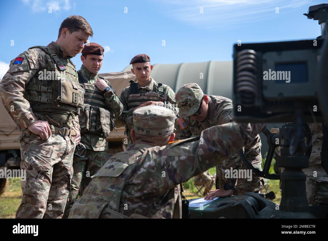 Staff Sgt. Dennis Yi, a U.S. Army Soldier assigned to Alpha Battery, 2nd Battalion, 146th Field ...