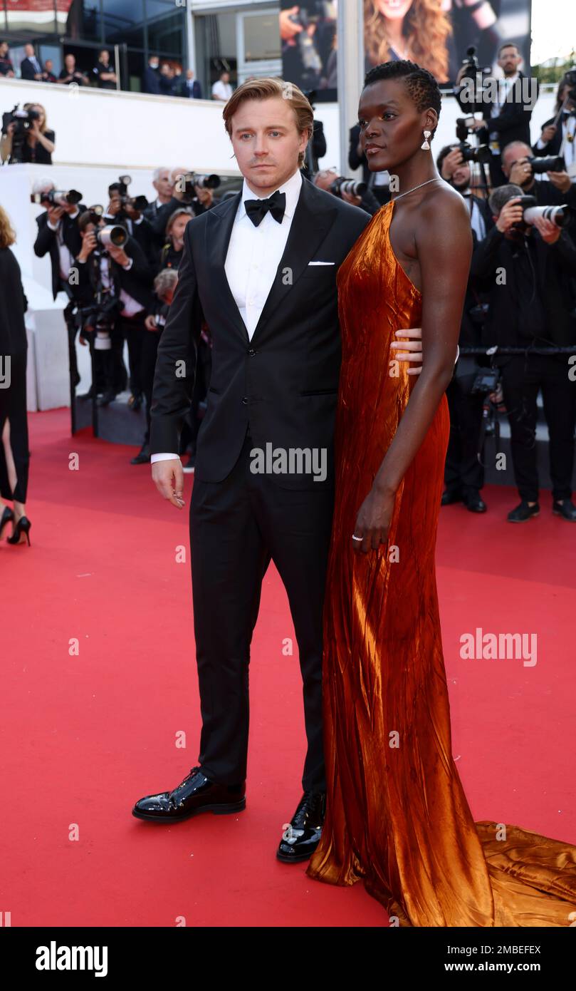Jack Lowden, left, and Sheila Atim pose for photographers upon arrival ...