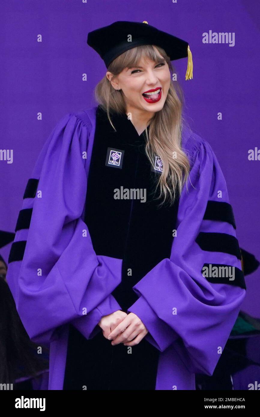 Taylor Swift reacts to the crowd during a graduation ceremony for New ...
