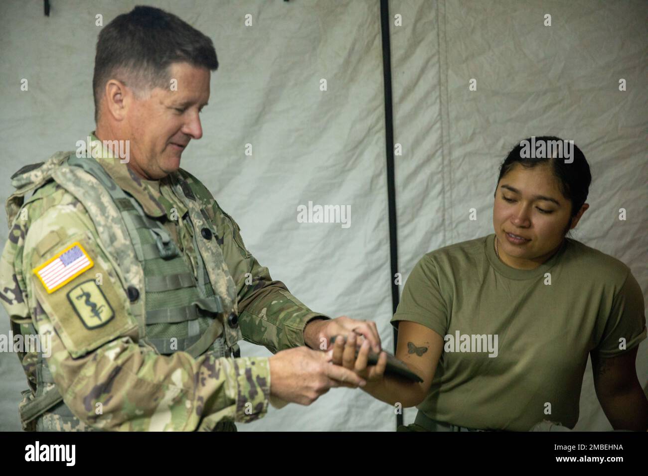 Army Reserve Maj. Eric Torina, an occupational therapist assigned to ...