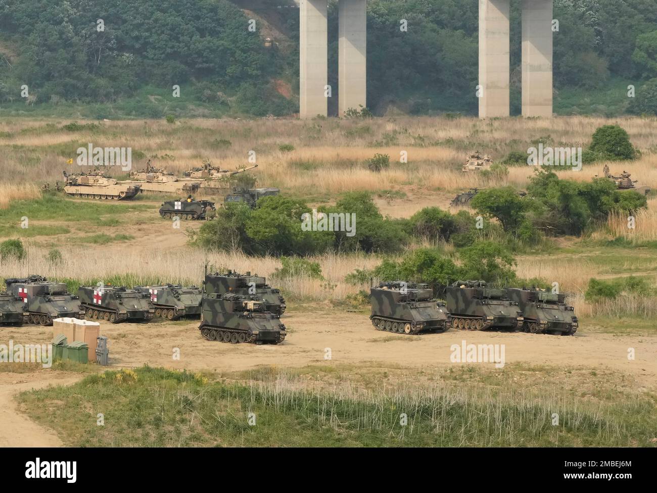 U.S. military armored vehicles park in Yeoncheon, near the border with ...
