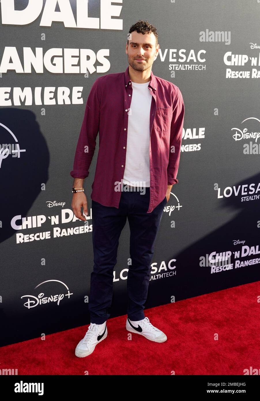 Dane DiLiegro poses at the premiere of the film "Chip 'n Dale: Rescue ...