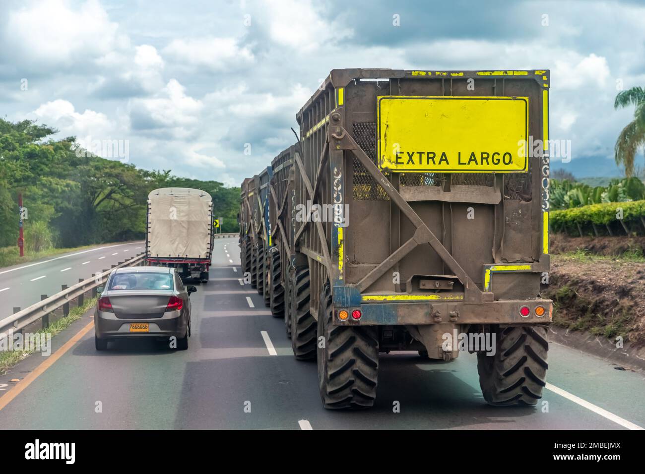 long truck from several trailers Stock Photo - Alamy