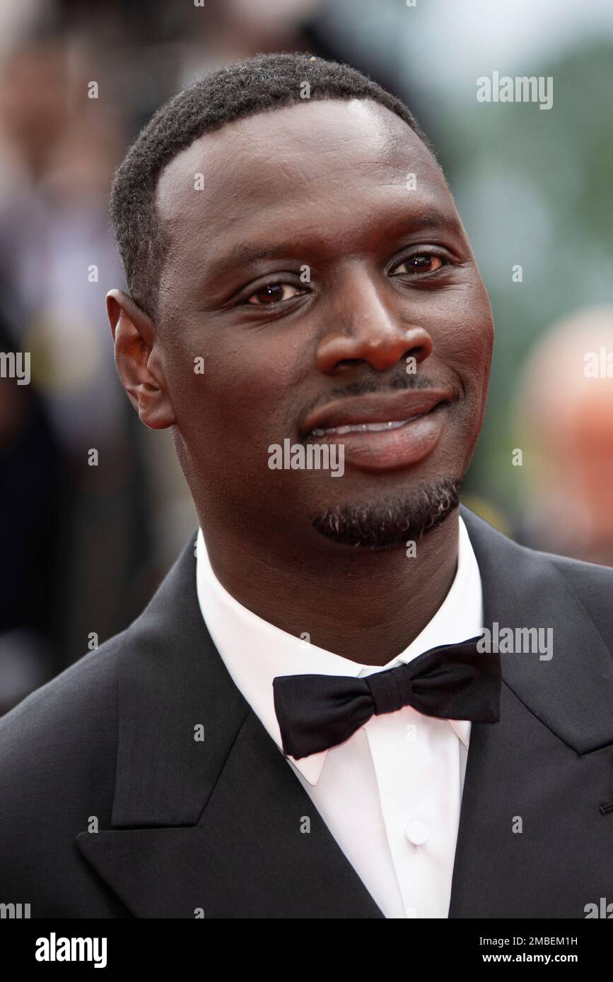 Omar Sy poses for photographers upon arrival at the premiere of the ...