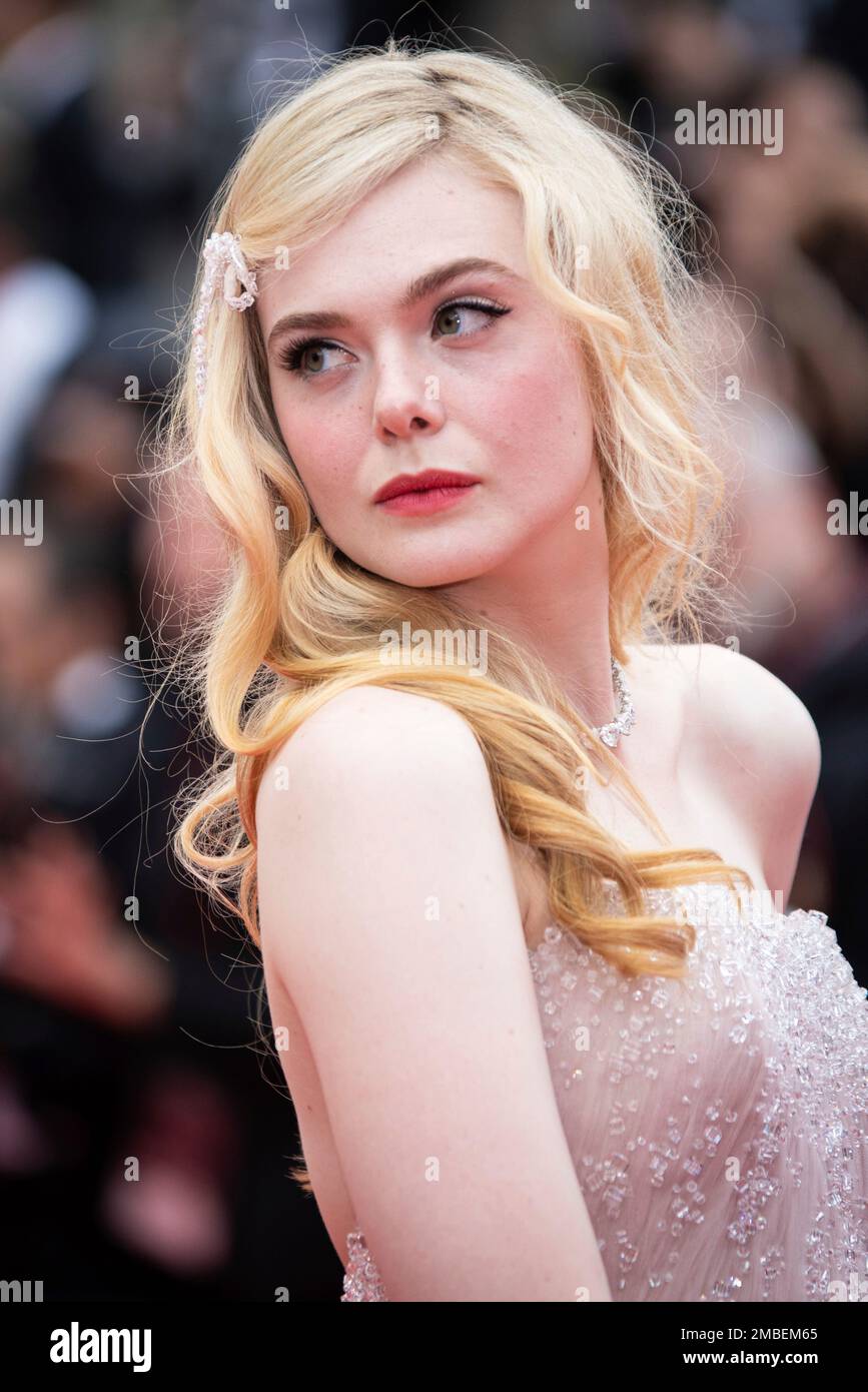 Elle Fanning poses for photographers upon arrival at the premiere of ...