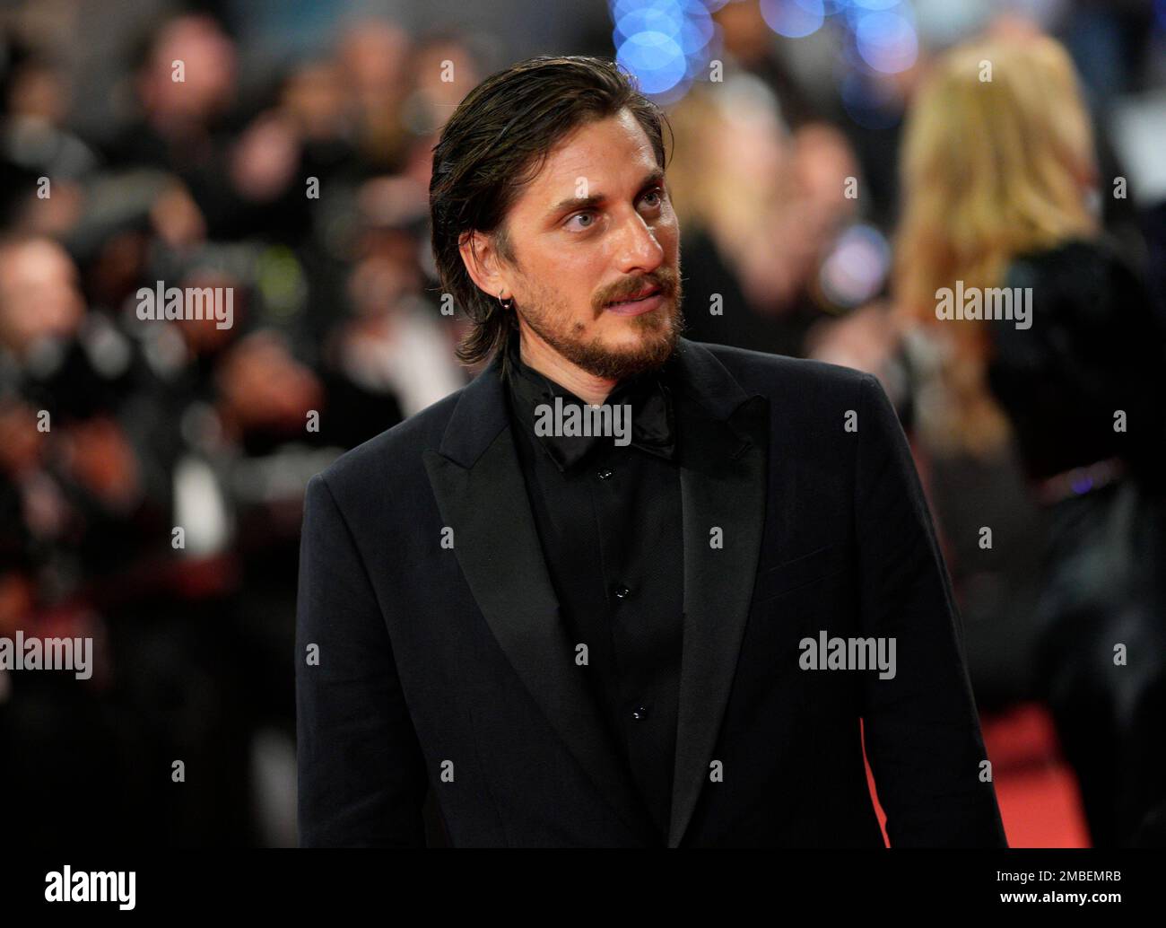 Luca Marinelli poses for photographers upon arrival at the premiere of ...
